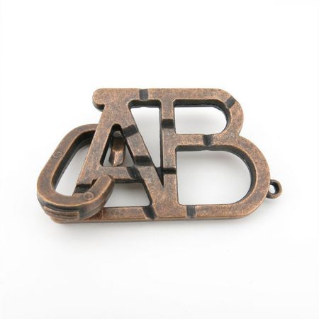 Buzzles Cast Hanayama IQ Bronze Puzzle Abc - 7 x 7 x 5.5 cm - Makhsoom
